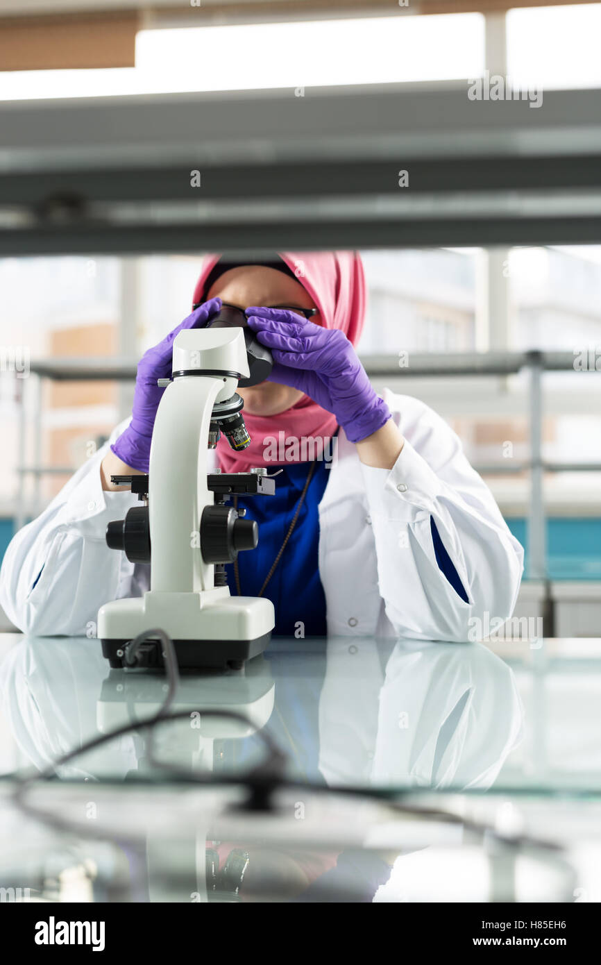 muslim lab worker doing an analysis Stock Photo - Alamy
