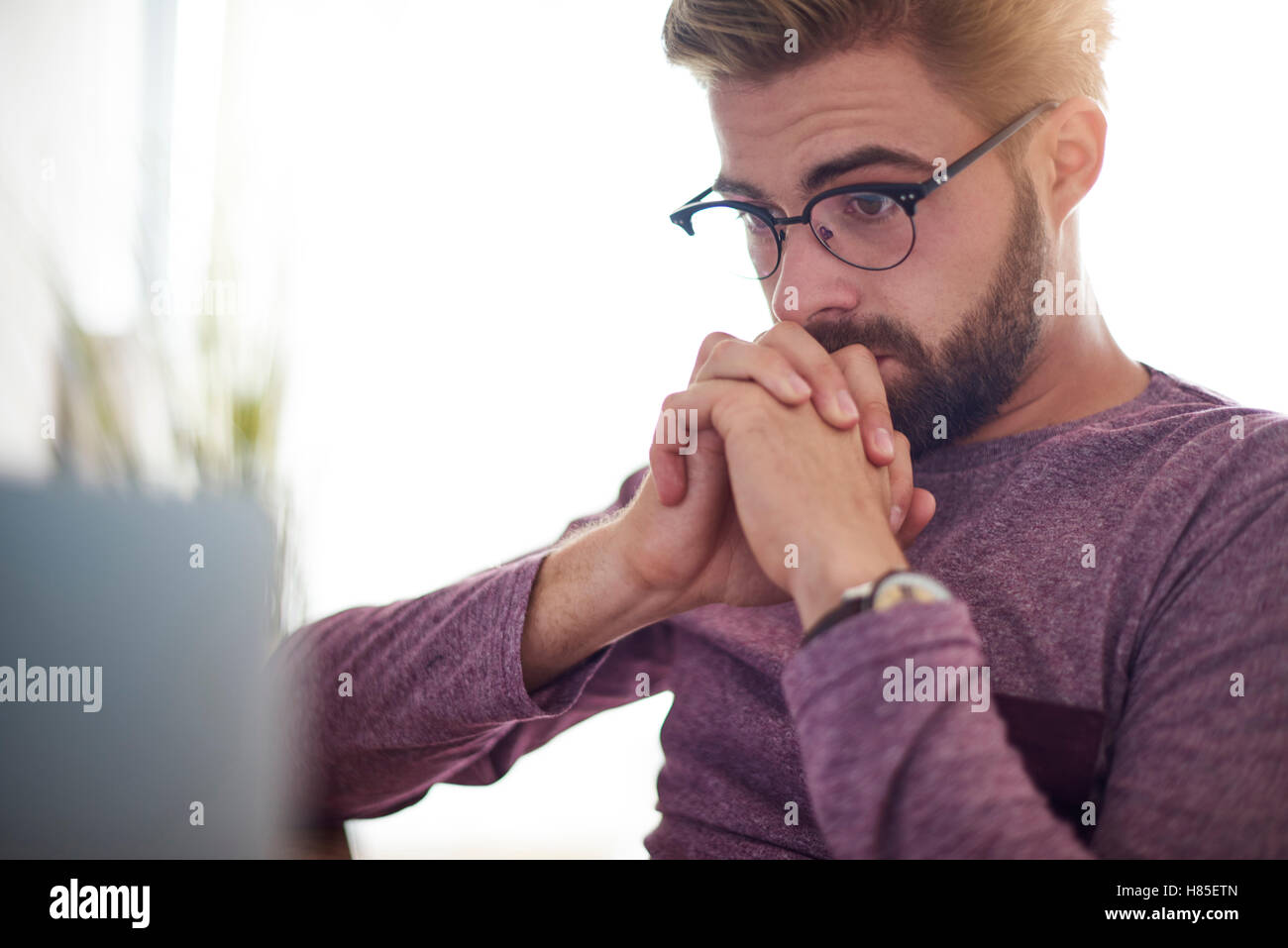 Busy man waiting for something important Stock Photo - Alamy