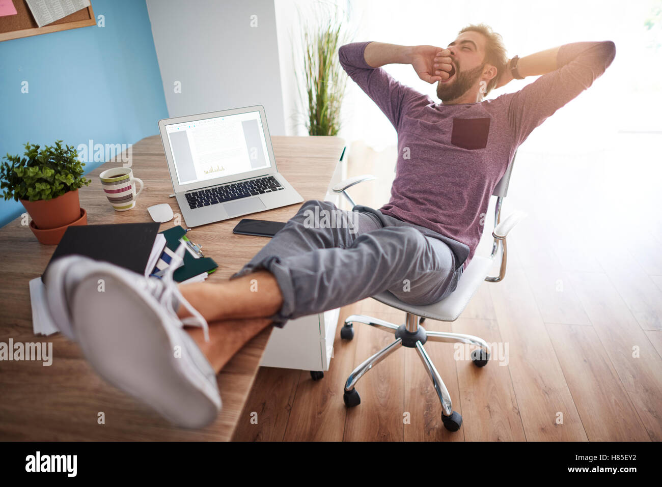Tired after long hours of work Stock Photo - Alamy