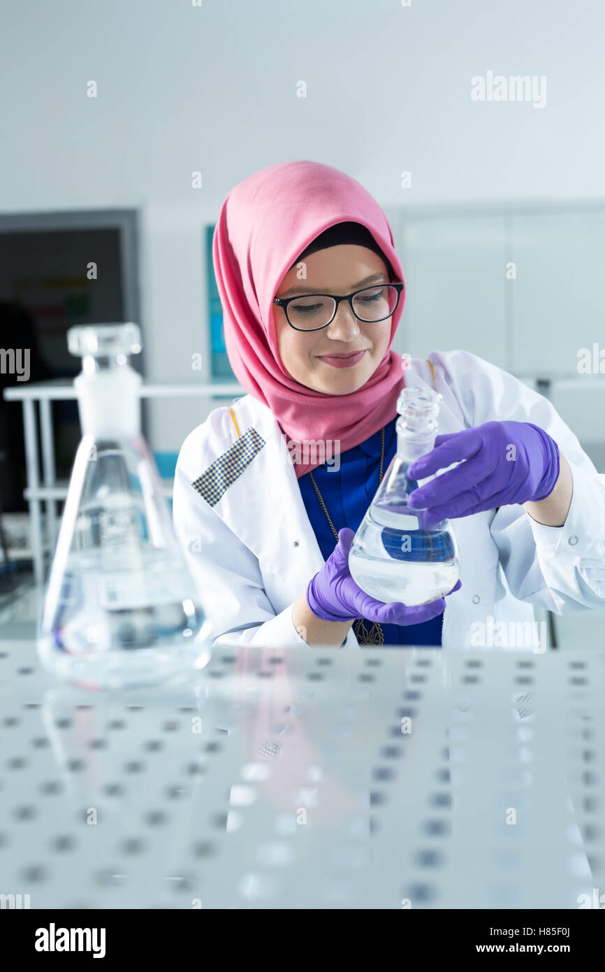 muslim lab worker doing an analysis Stock Photo - Alamy