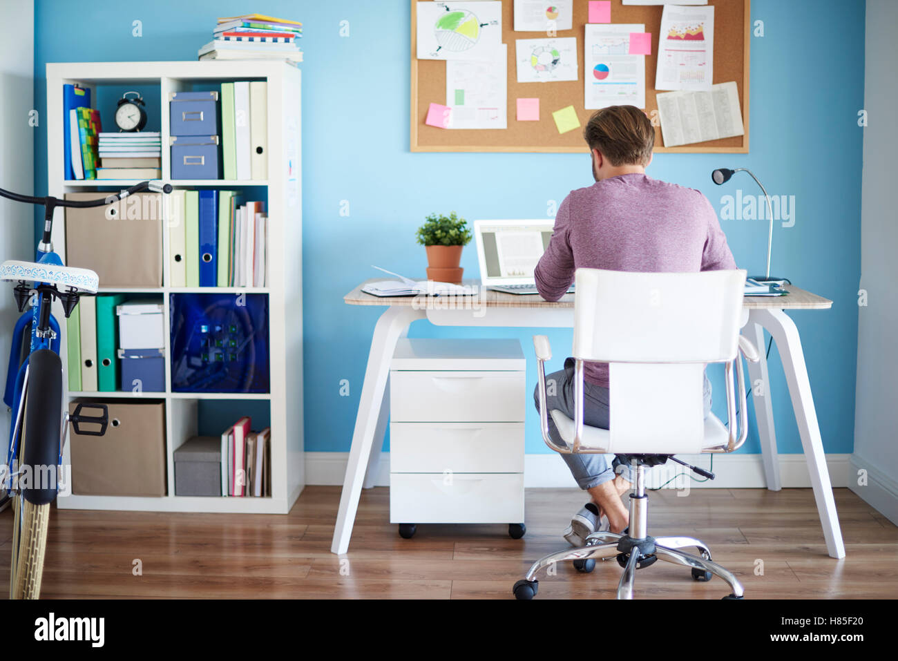 Man laptop home rear view hi-res stock photography and images - Alamy