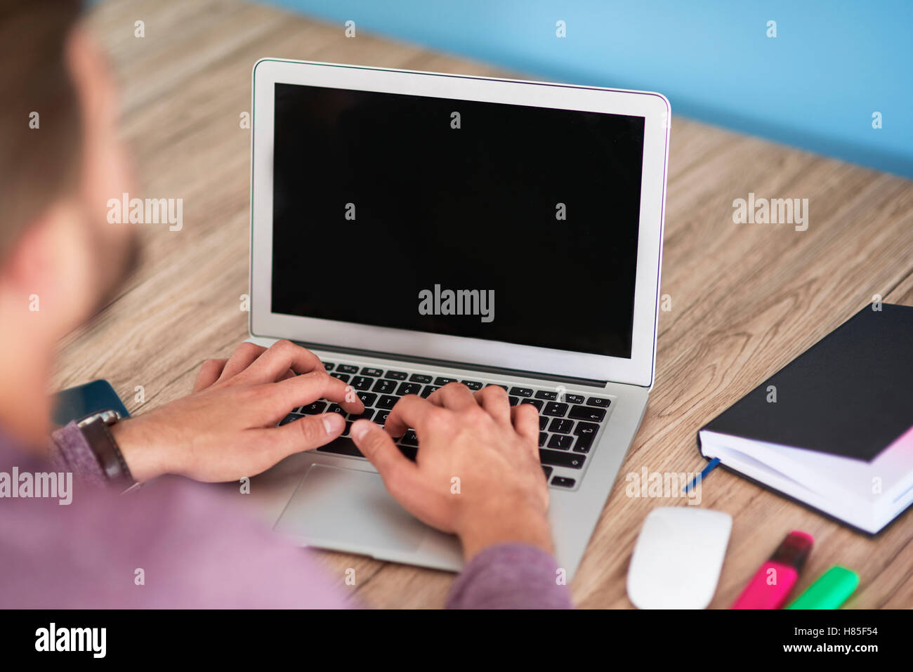 Focus on laptop on the desk Stock Photo - Alamy