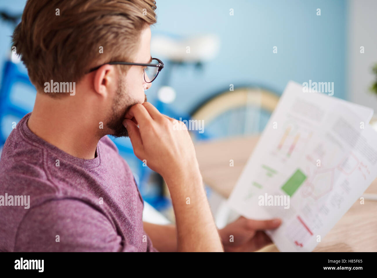 Browsing some important documents at home Stock Photo - Alamy
