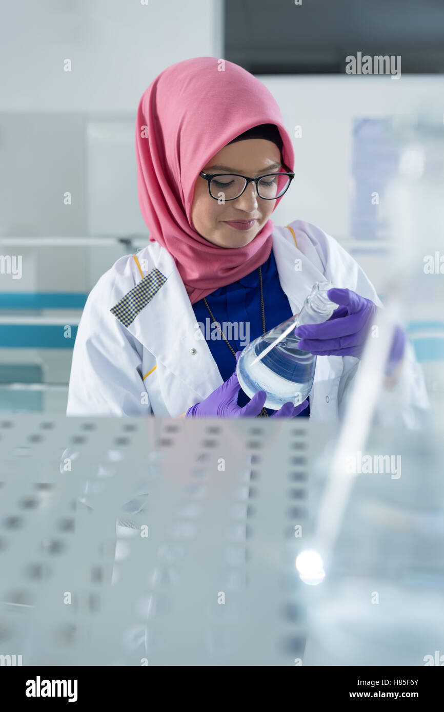 muslim lab worker doing an analysis Stock Photo - Alamy