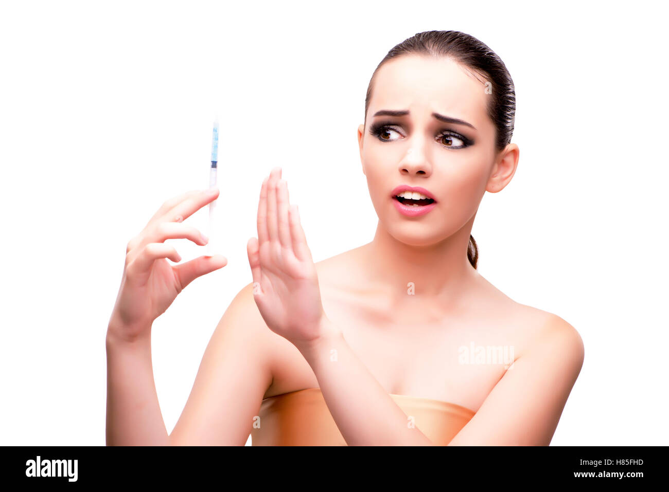 Woman scared of plastic surgery isolated on white Stock Photo - Alamy