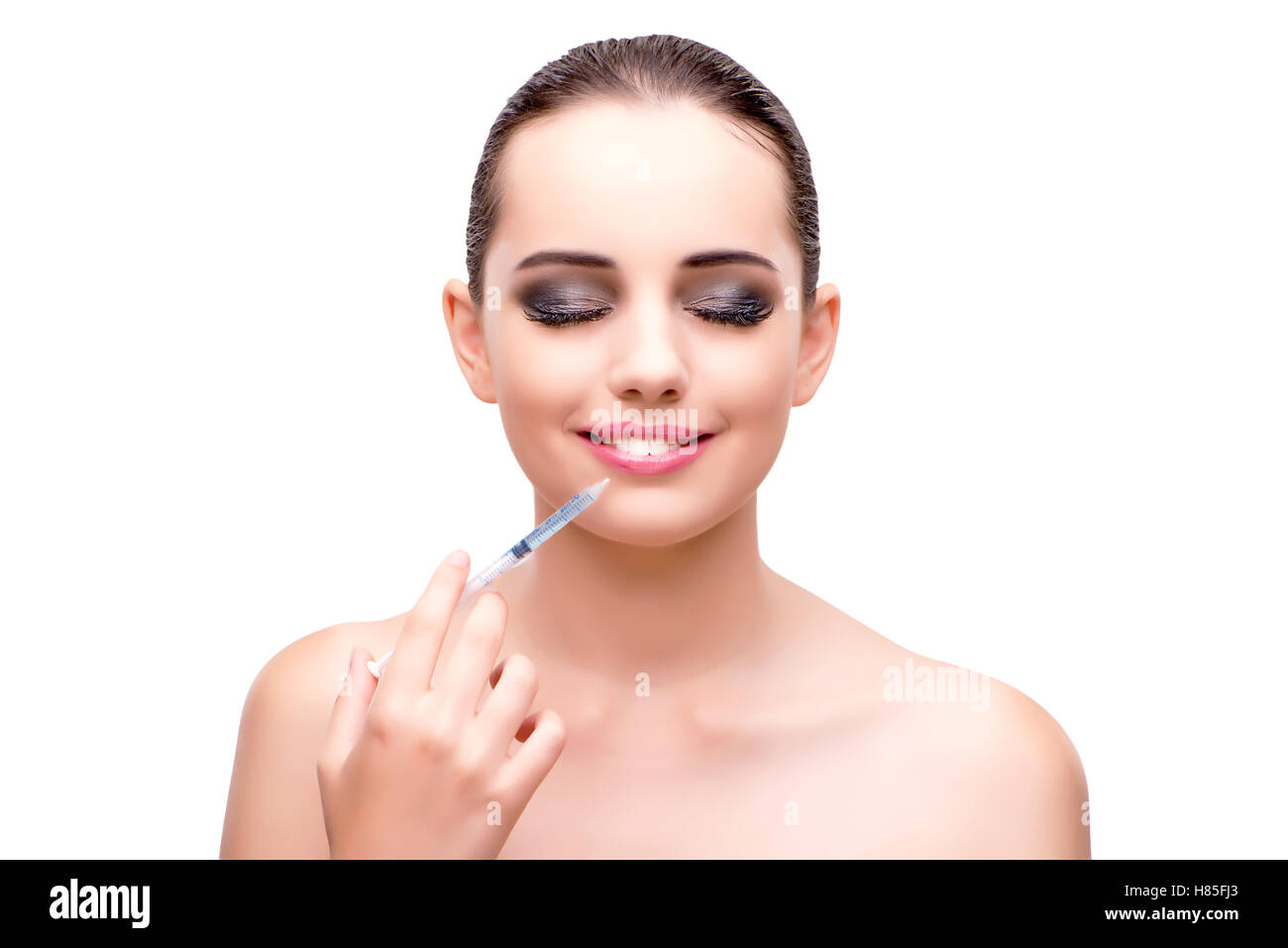 Woman undergoing plastic surgery isolated on white Stock Photo - Alamy