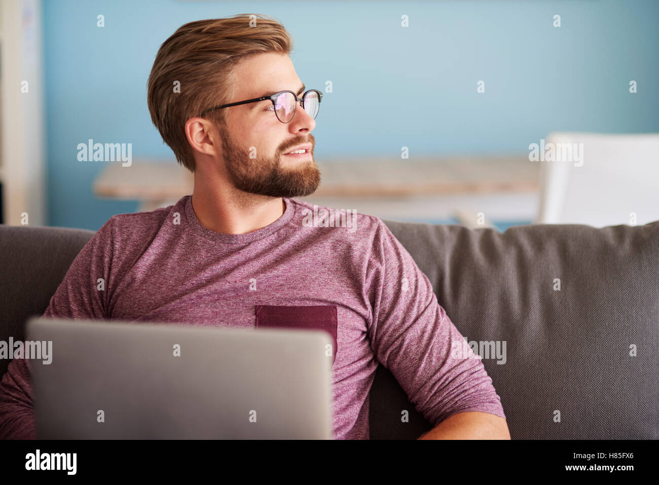 Handsome man working at home Stock Photo - Alamy