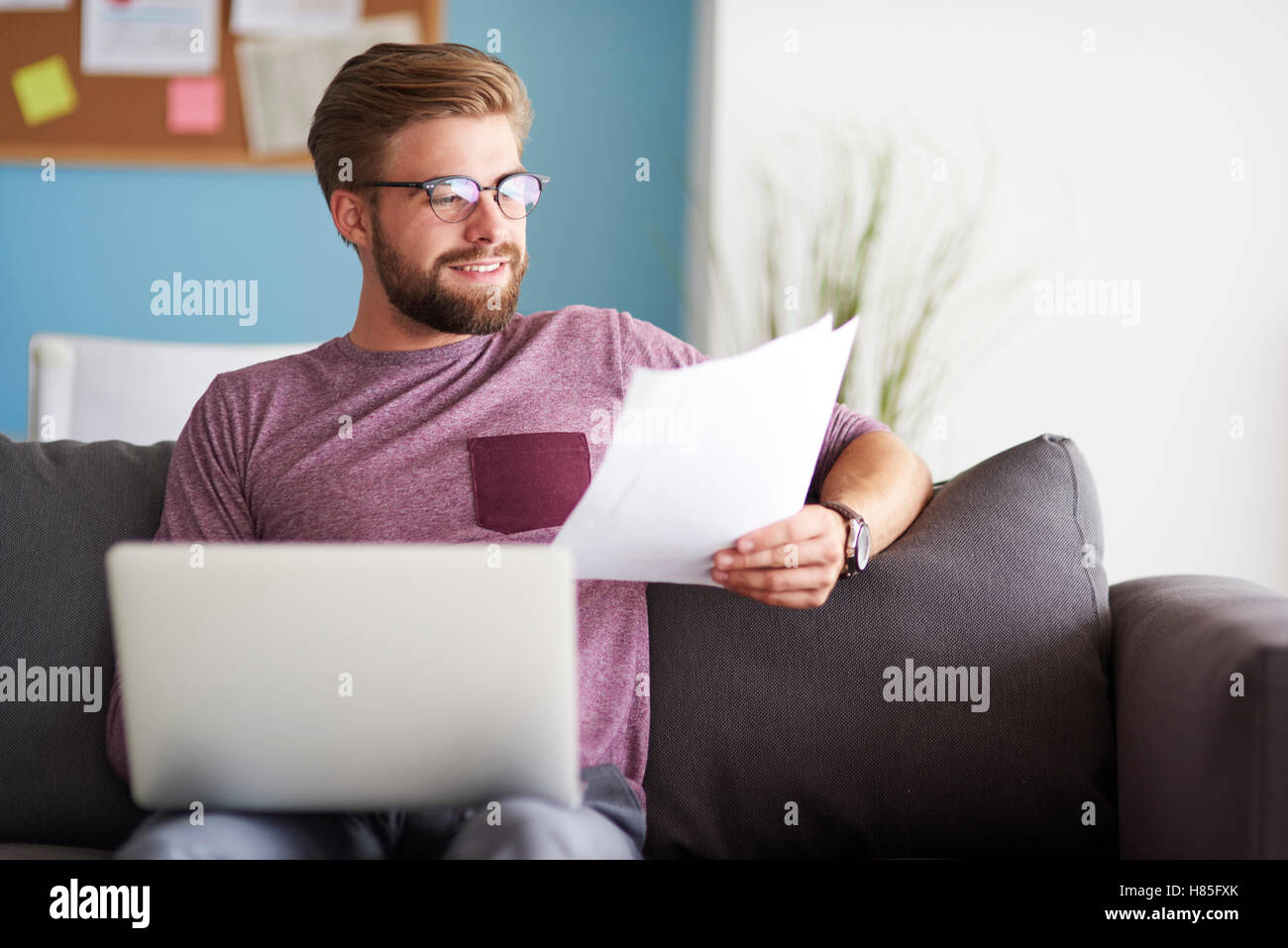 Handsome man working at home Stock Photo - Alamy