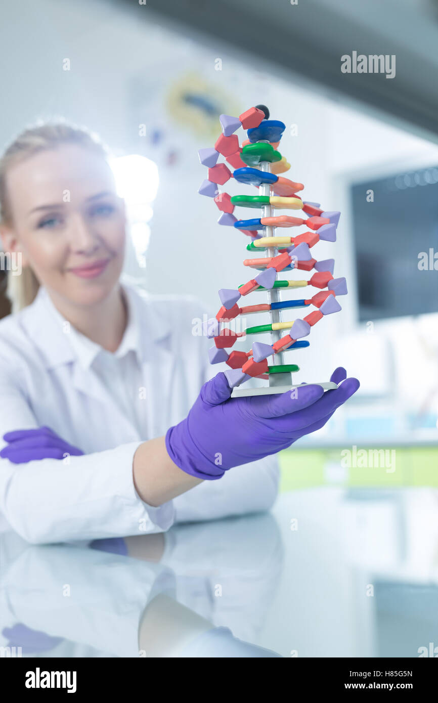 Woman Scientist Touching Dna Molecule High Resolution Stock Photography ...