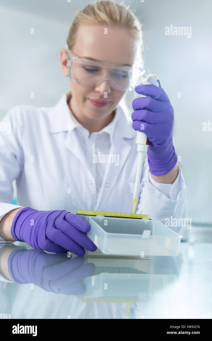Young pretty girl in the modern laboratory Stock Photo - Alamy