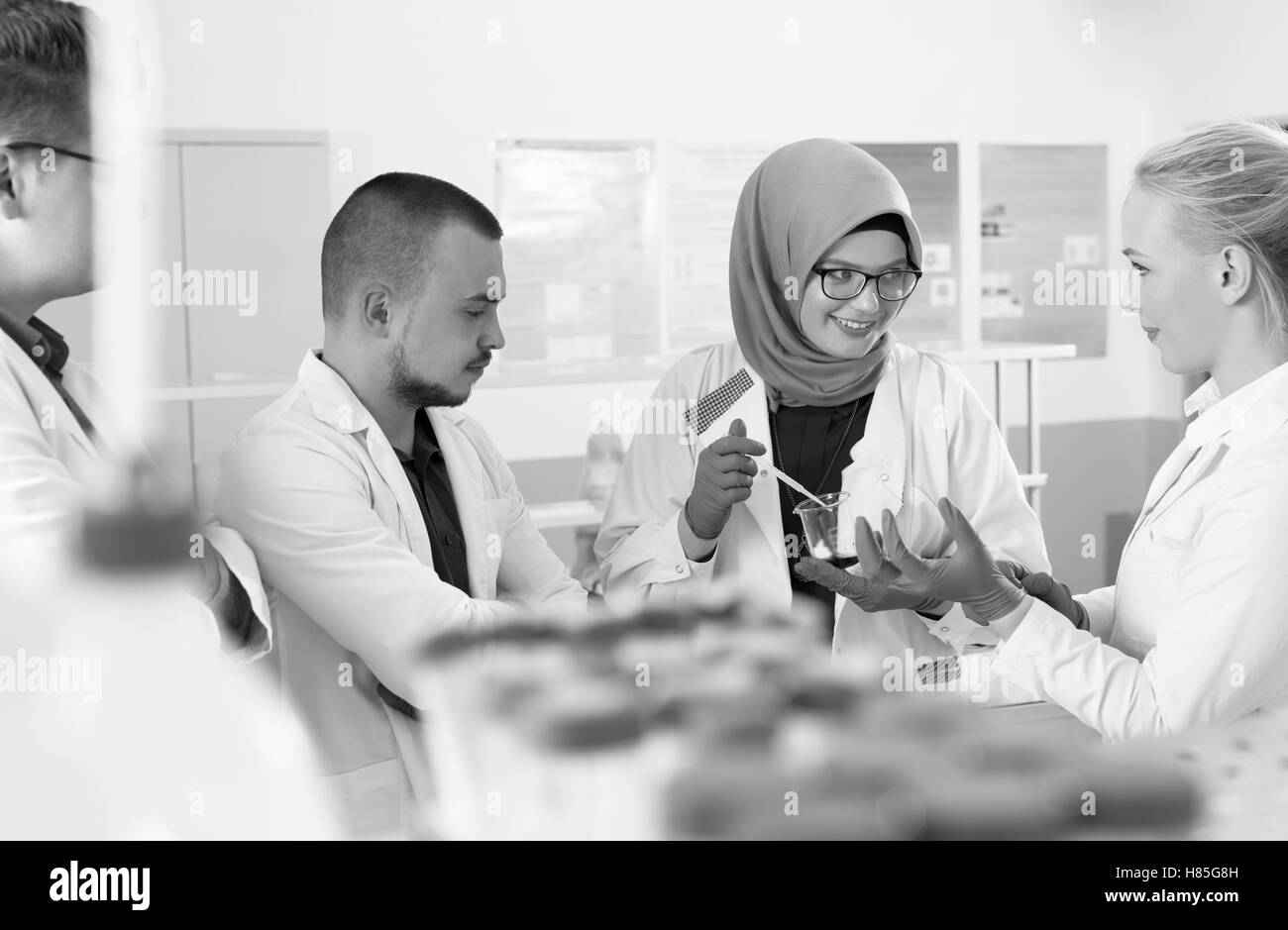 group of scientists working at the laboratory Stock Photo - Alamy