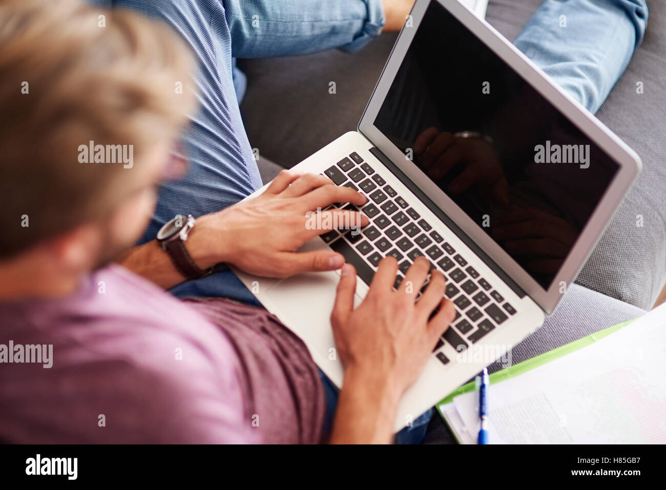 Working at home with laptop Stock Photo - Alamy