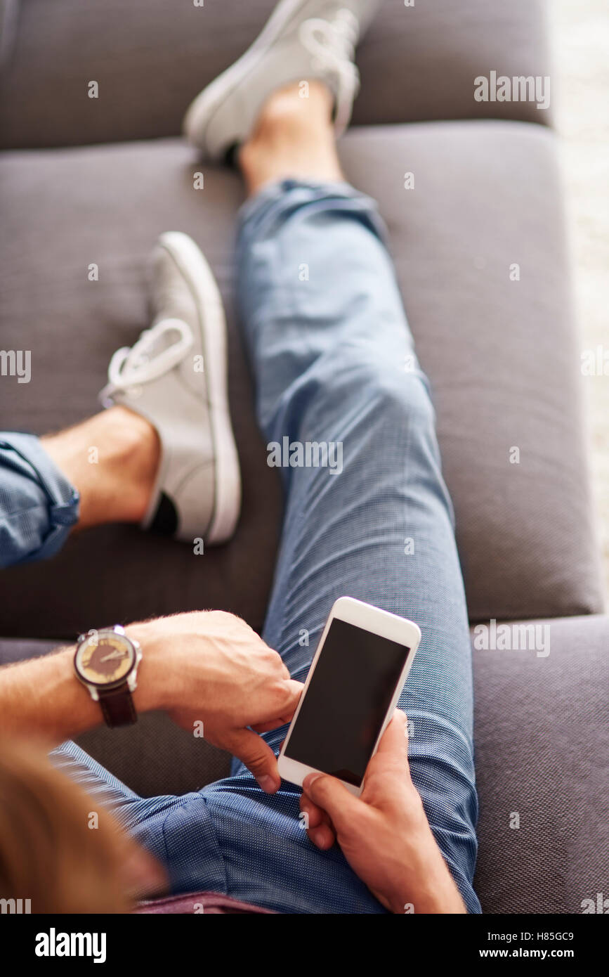 Close up man which holding the mobile phone Stock Photo - Alamy