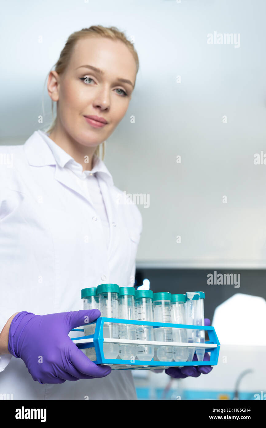 Young pretty girl in the modern laboratory Stock Photo - Alamy
