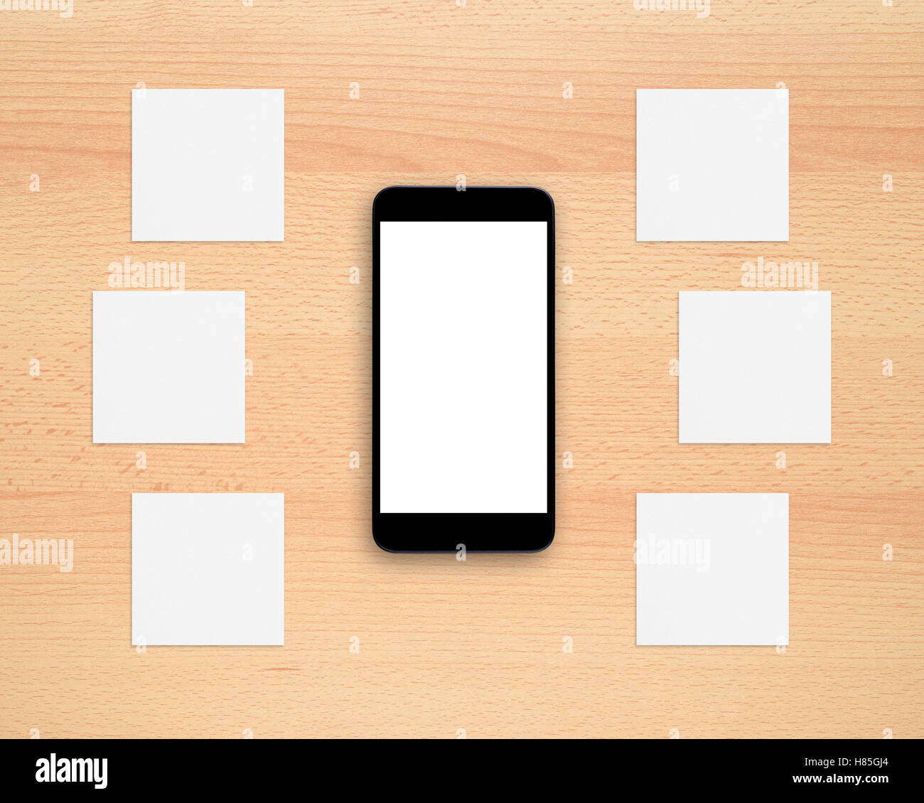 Smartphone and paper for notes on office desk Stock Photo - Alamy