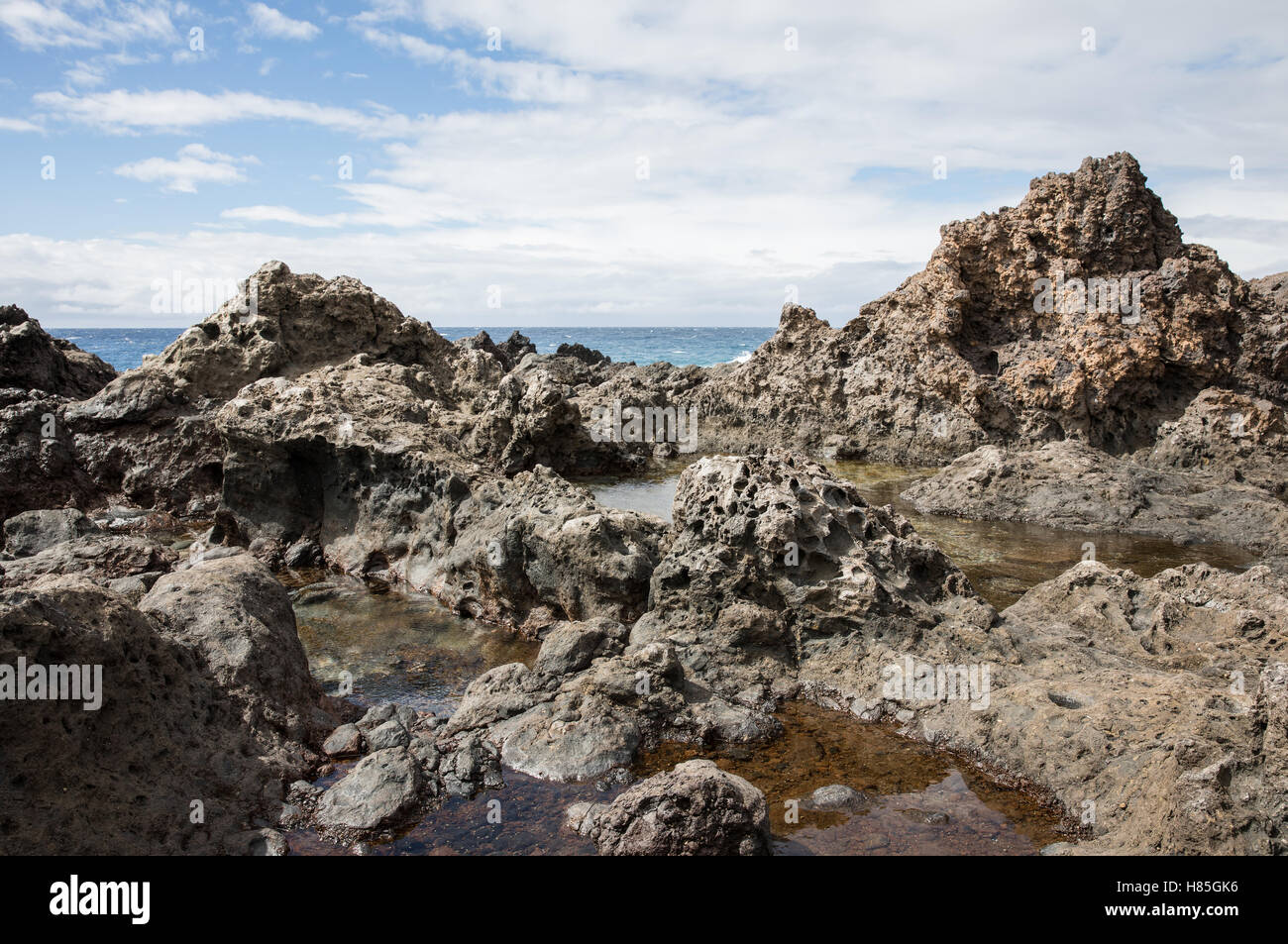 Volcanic rocks in Playa San Juan - Tenerife Stock Photo - Alamy