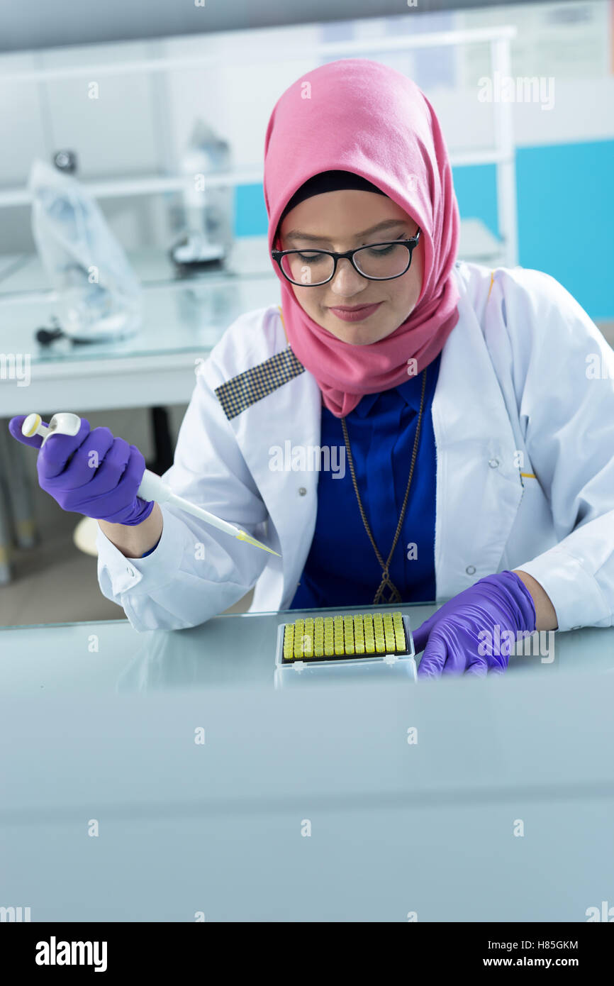 muslim lab worker doing an analysis Stock Photo - Alamy