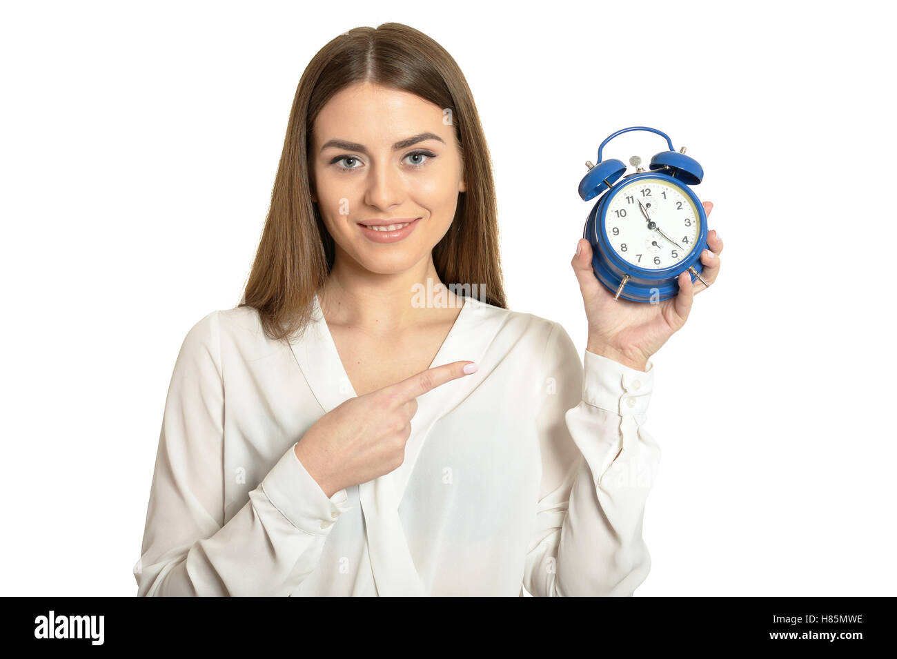 Beautiful woman with clock Stock Photo - Alamy