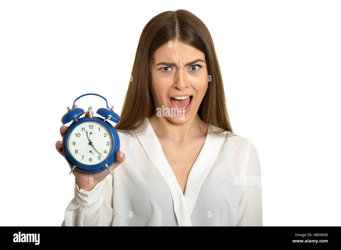 Beautiful woman with clock Stock Photo - Alamy
