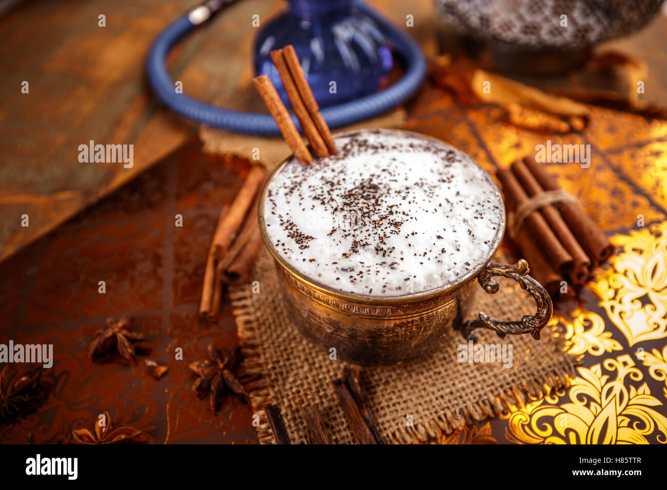 Chai Tea Latte drink in an antique cup Stock Photo - Alamy