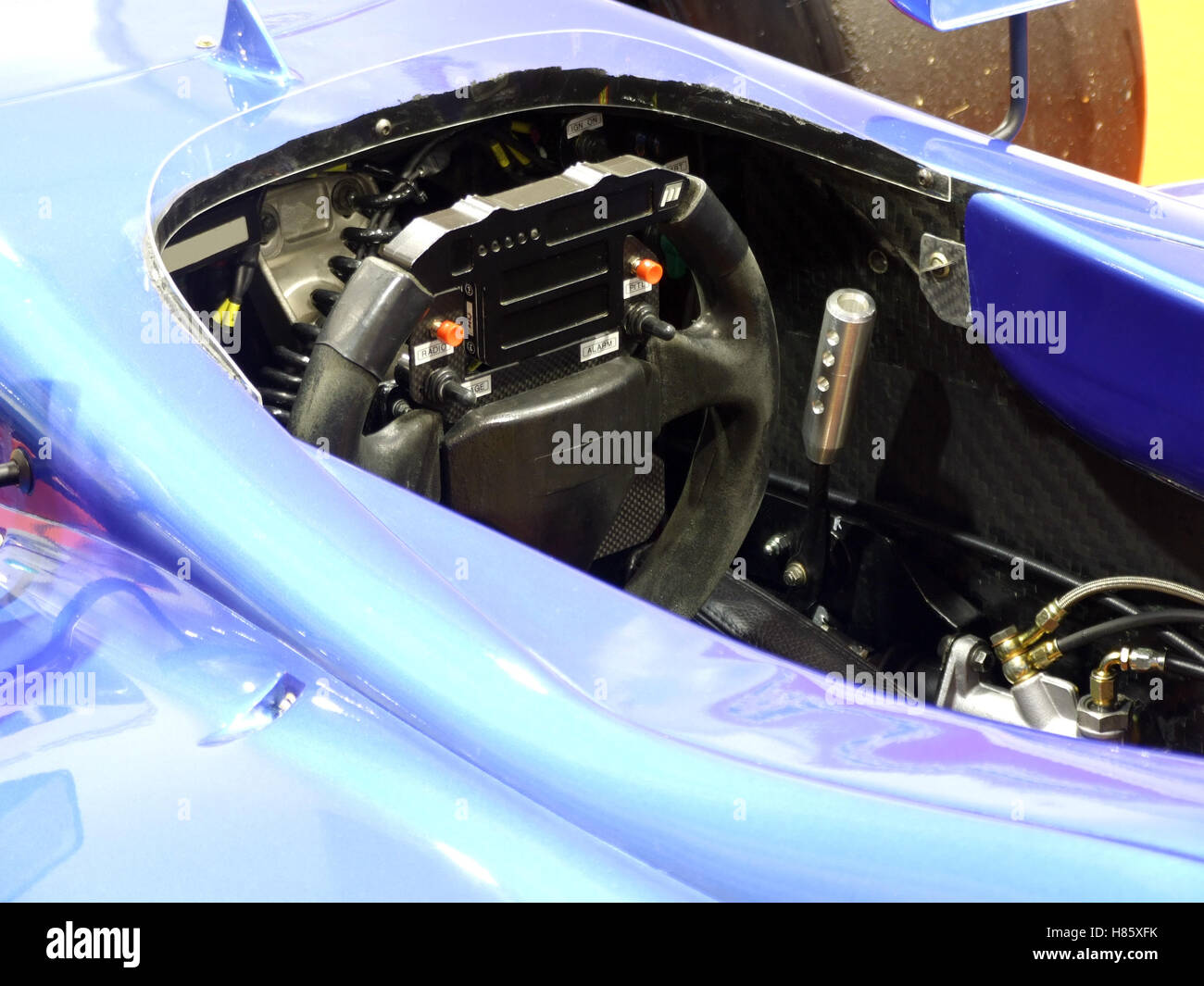 racing car dashboard and steering wheel Stock Photo - Alamy