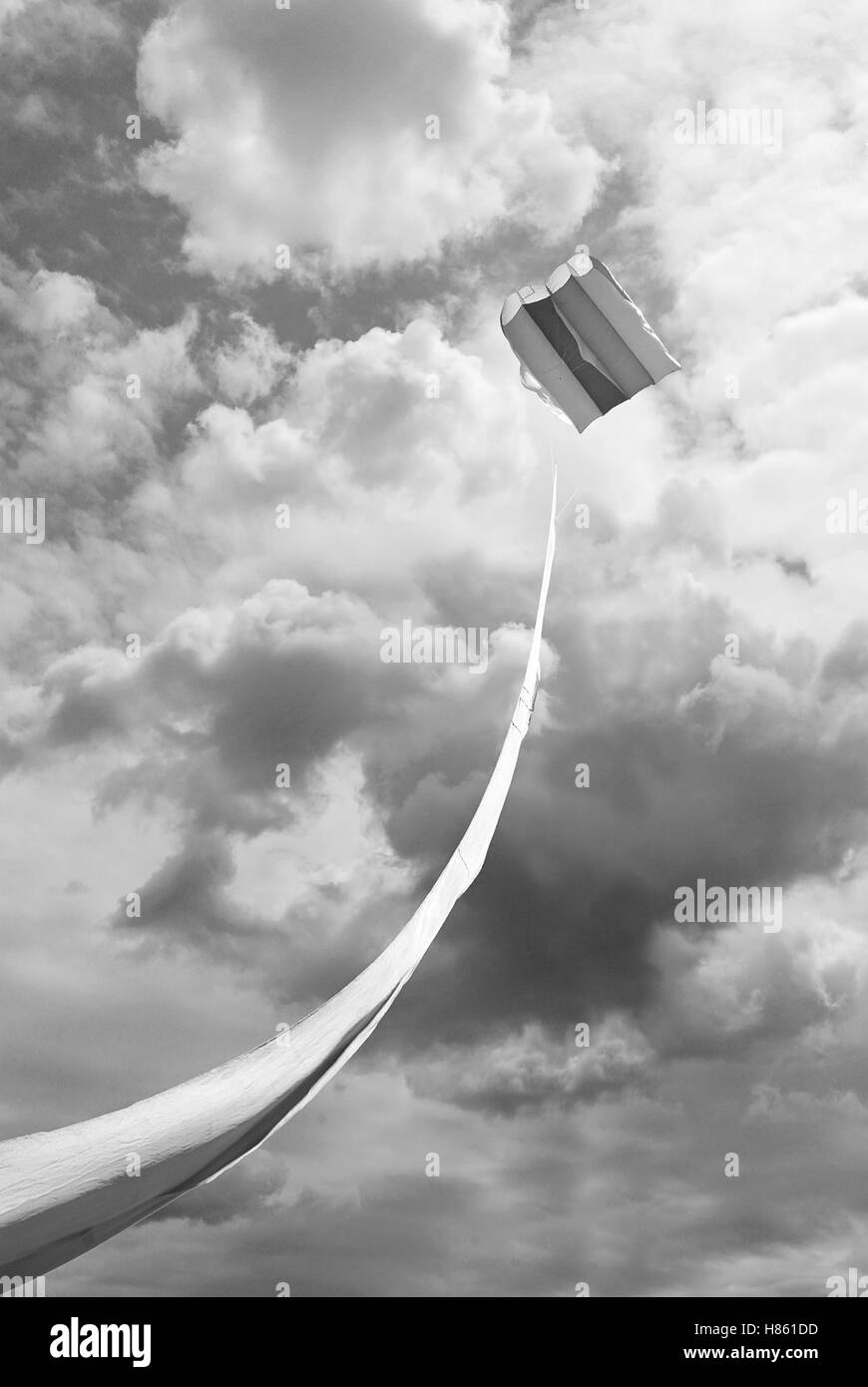 kite under cloudy sky with lightning Stock Photo - Alamy