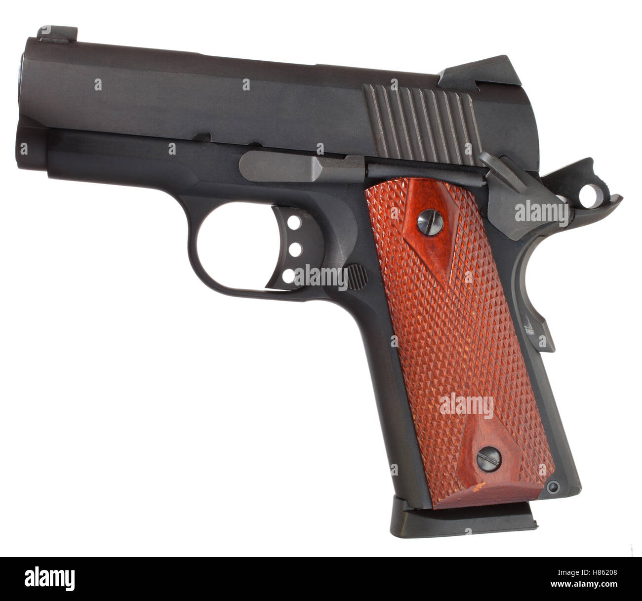 Small black handgun that is isolated on a white background Stock Photo ...