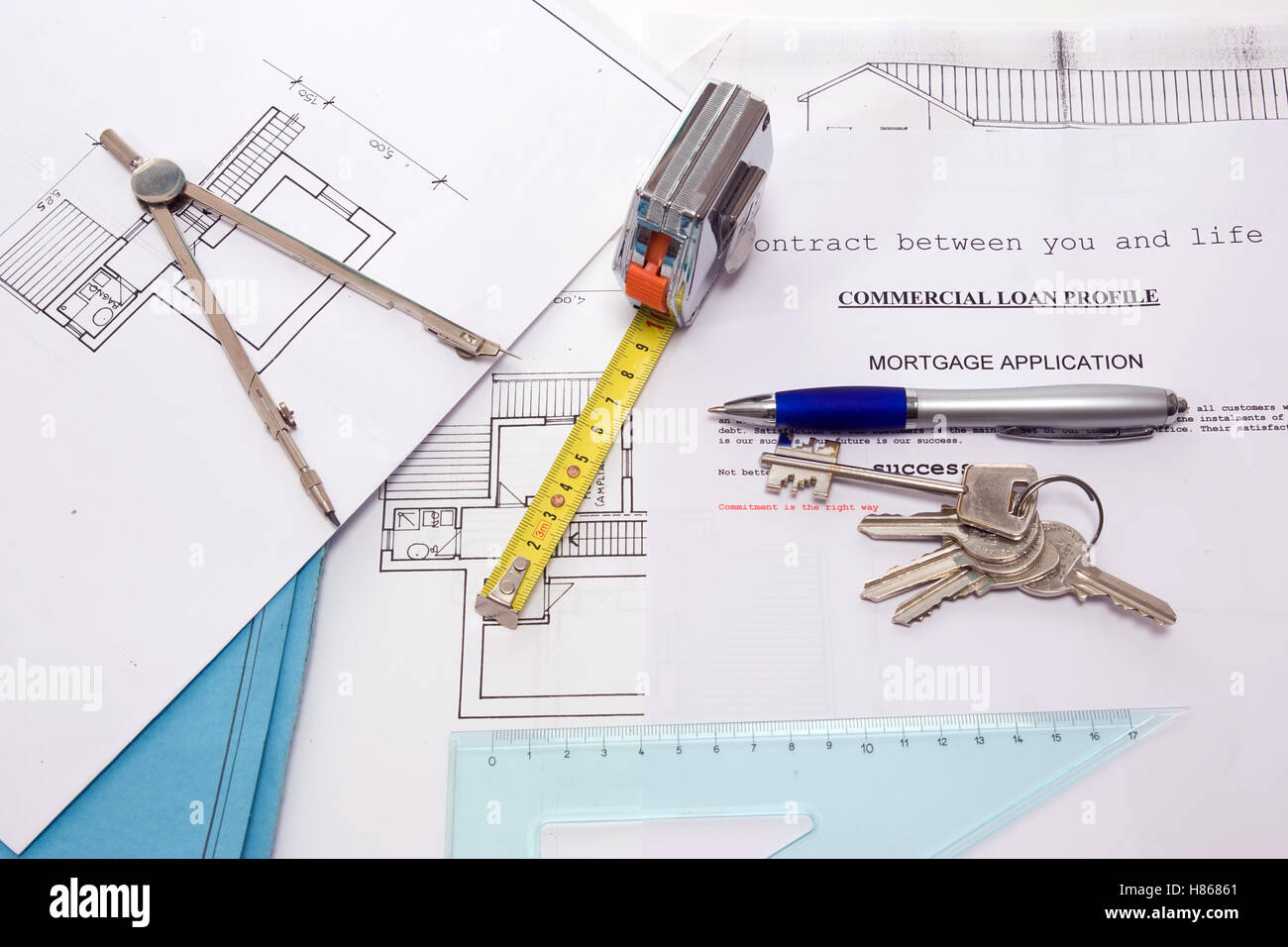 plans and projects for house builder Stock Photo - Alamy