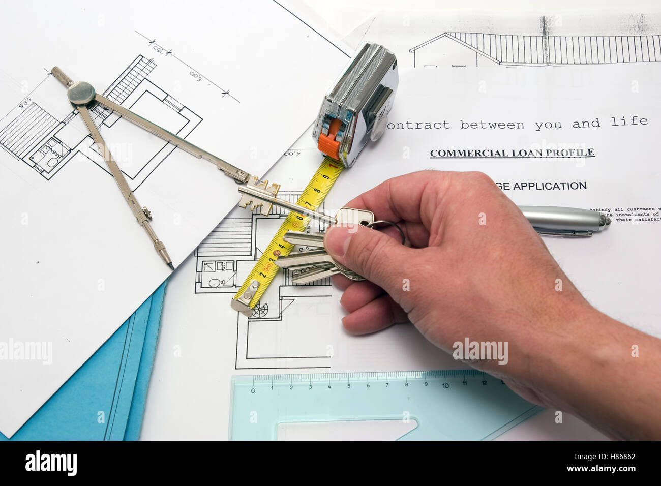 plans and projects for house builder Stock Photo - Alamy