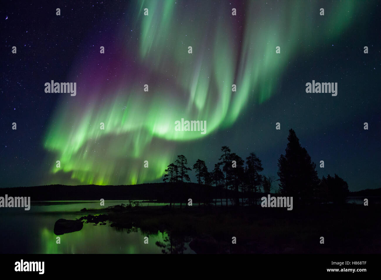 Lake and aurora borealis, Lake Inari, Lapland, Finland Stock Photo - Alamy