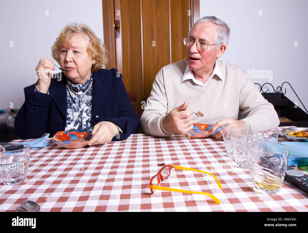 elderly couple at table Stock Photo - Alamy