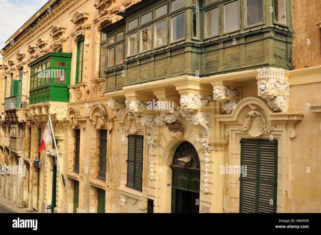 Row of buildings with balconies, Valletta, Malta Stock Photo - Alamy