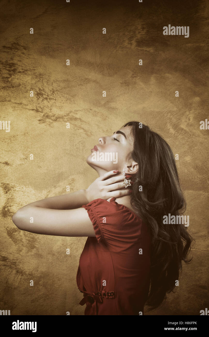 Profile of a young woman hand on neck Stock Photo - Alamy