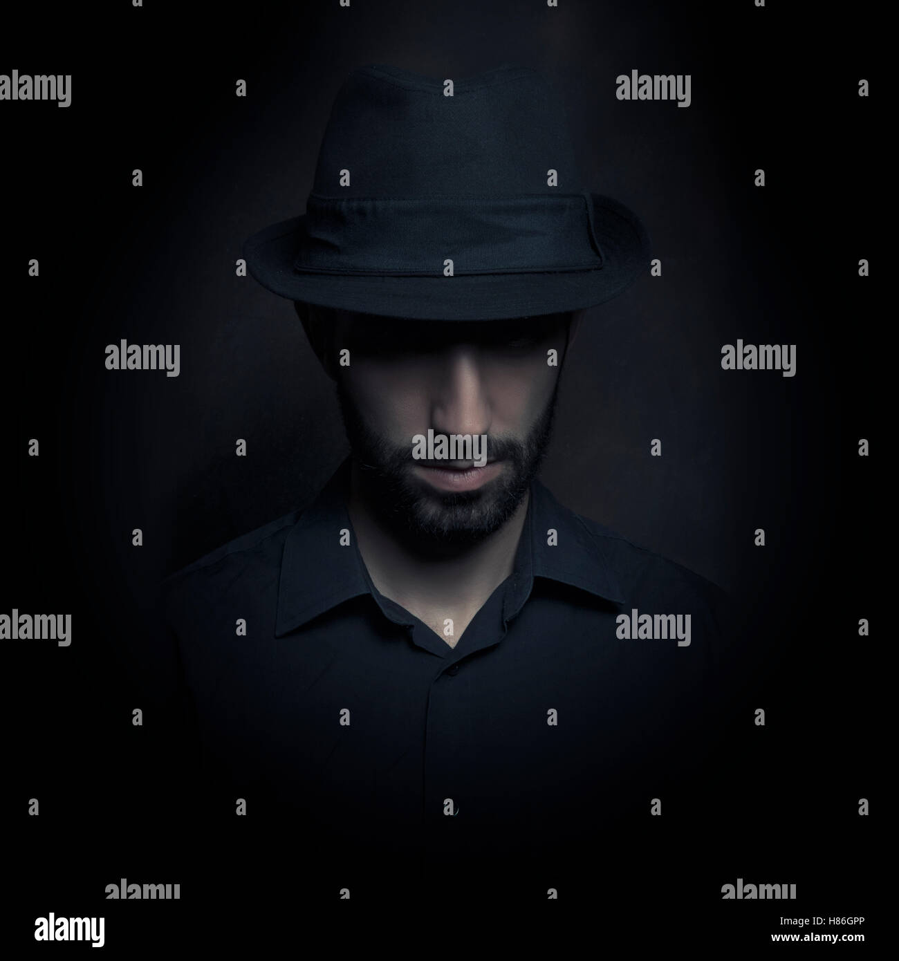 Sinister looking man wearing hi-res stock photography and images - Alamy
