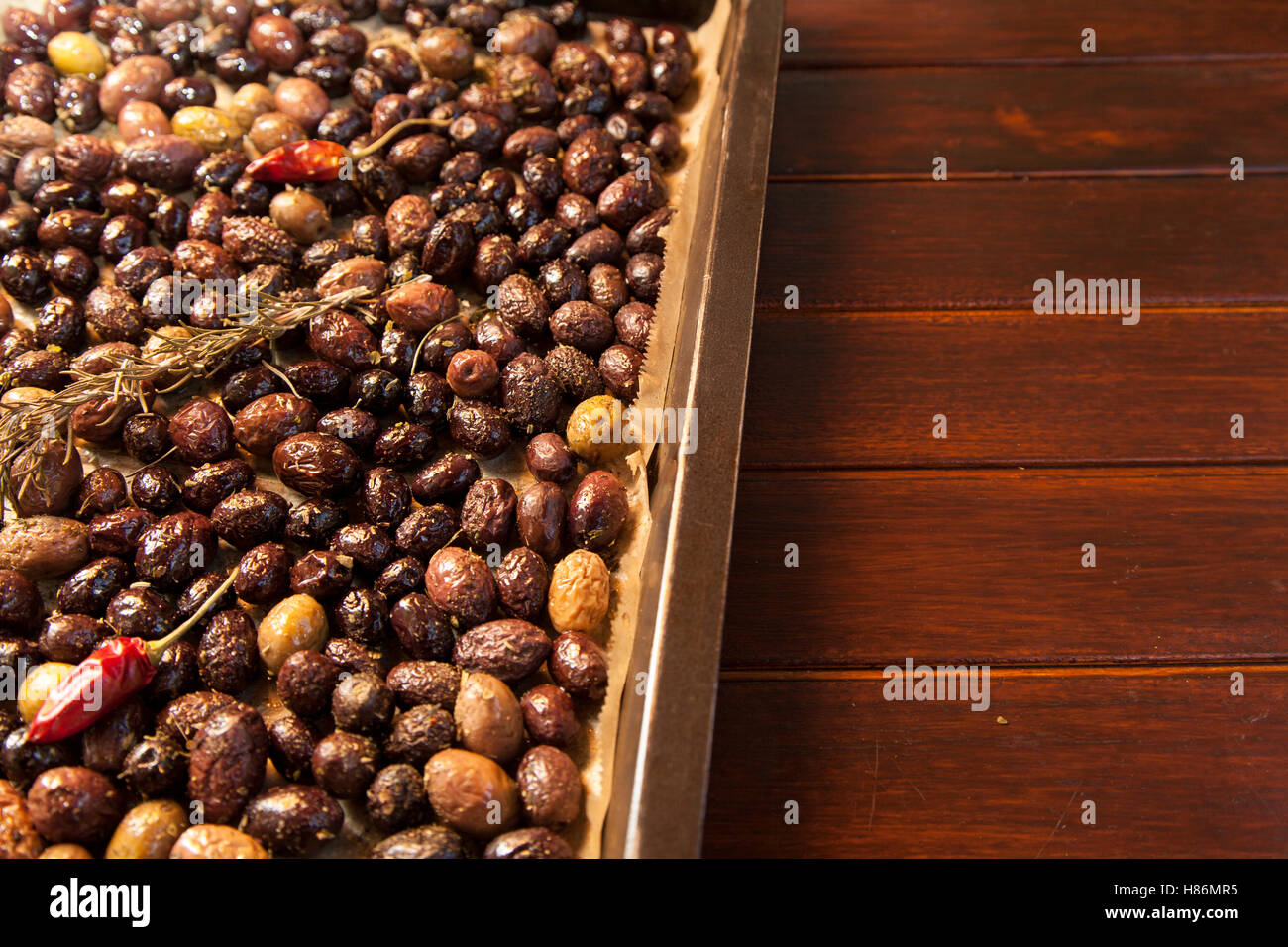 Fried fresh black olives hi-res stock photography and images - Alamy
