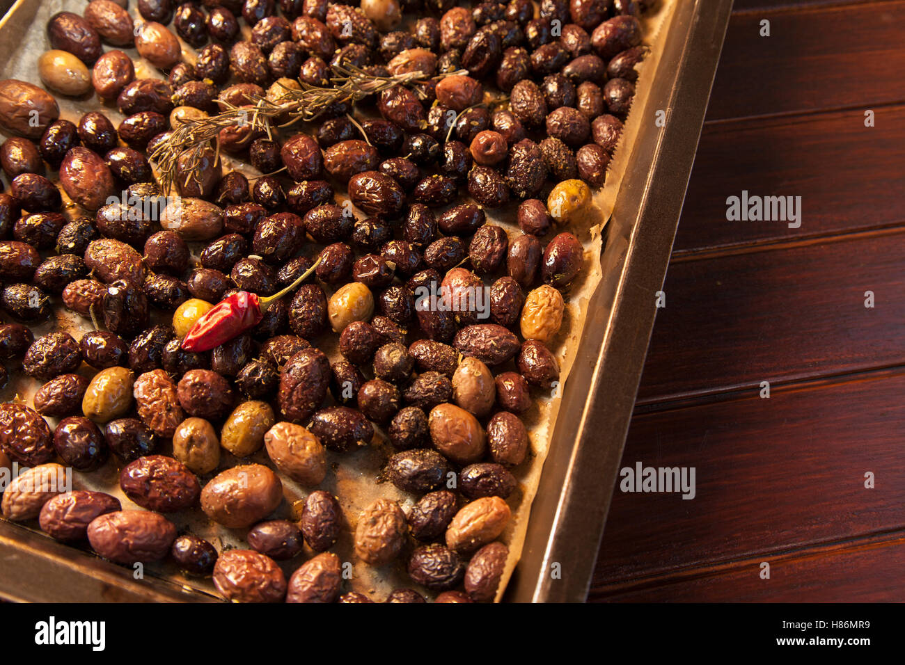 Fried fresh black olives hi-res stock photography and images - Alamy