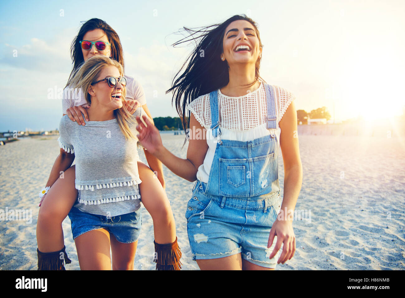 Woman approaching friends hi-res stock photography and images - Alamy