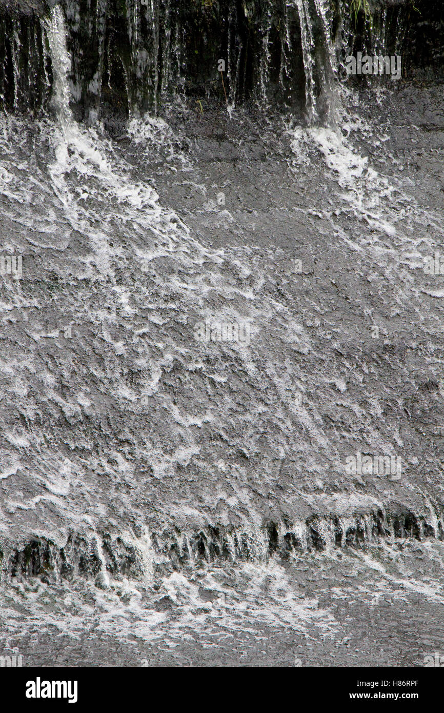 Waterfall running over a stone slope Stock Photo - Alamy