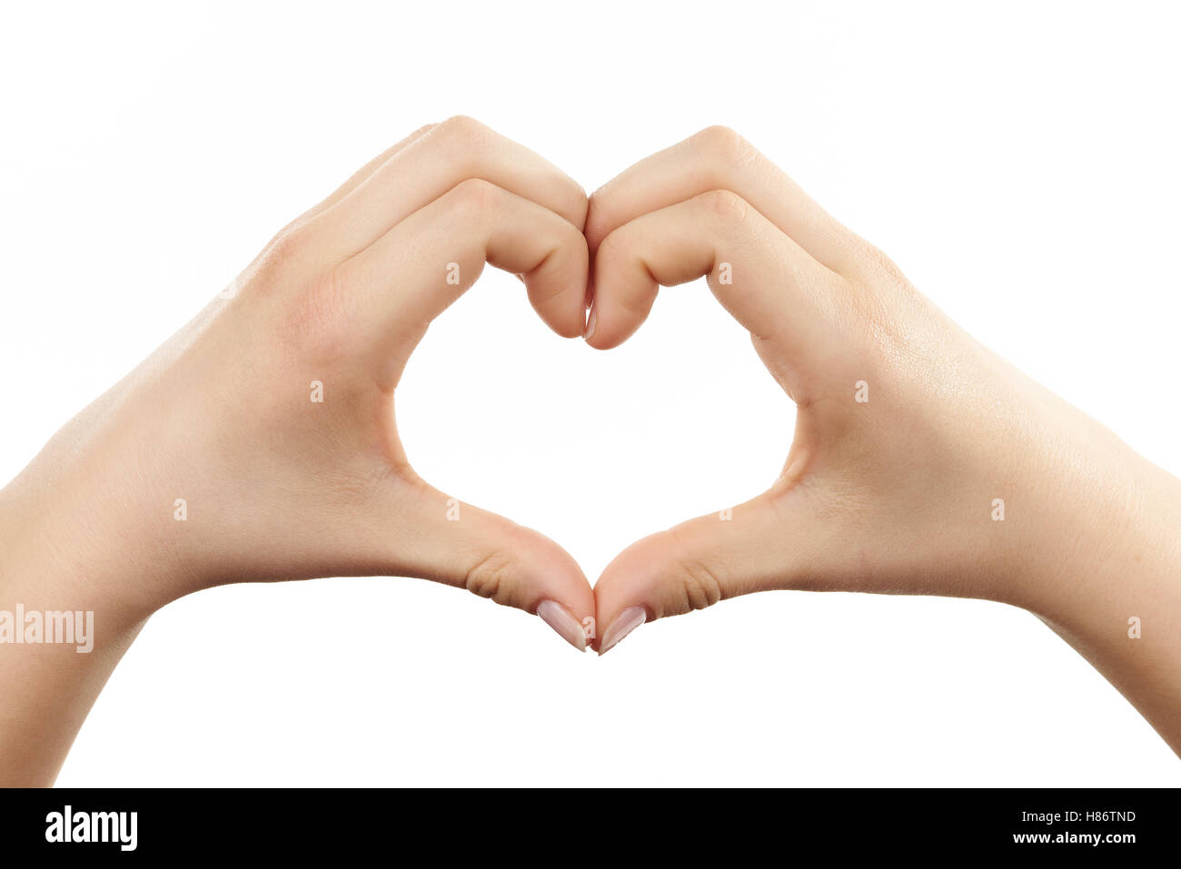 Woman hand in heart shape isolated on white background Stock Photo - Alamy