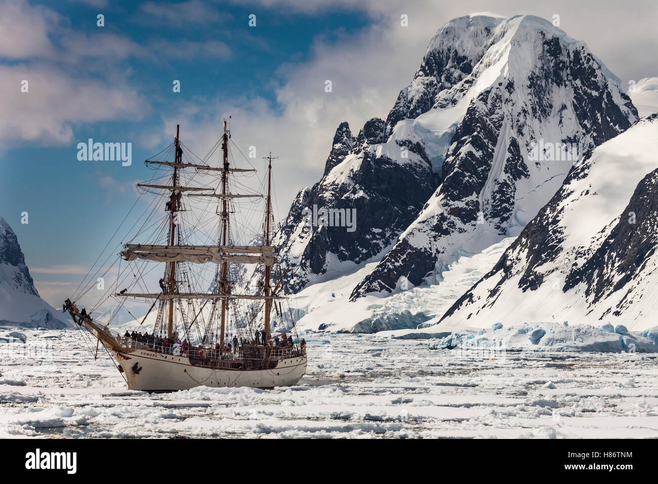 Tourist ship Europa in heavy pack ice beneath Mount Scott, Penola ...
