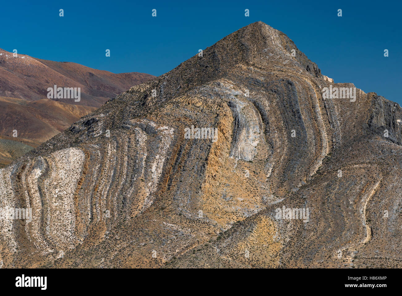 Butte showing sedimentary layers, Death Valley National Park ...