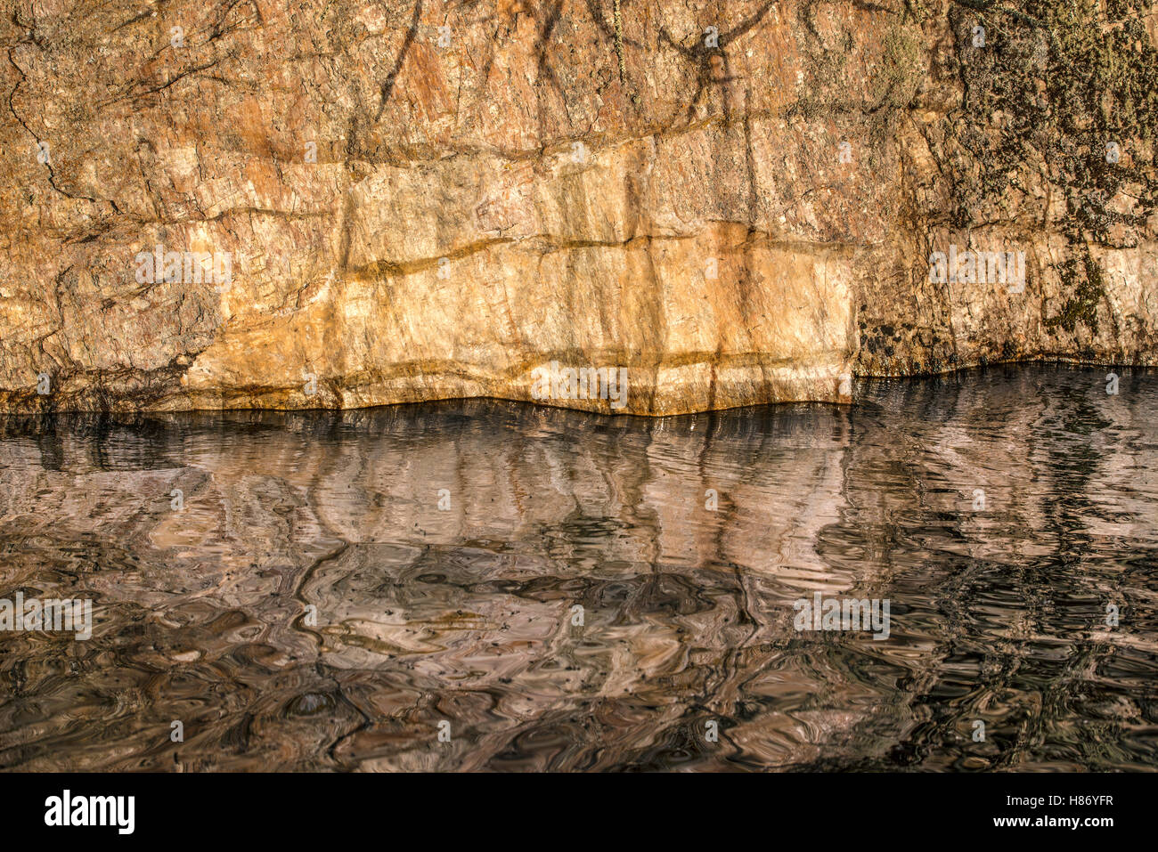 Cliff reflected in lake, Minnesota Stock Photo - Alamy