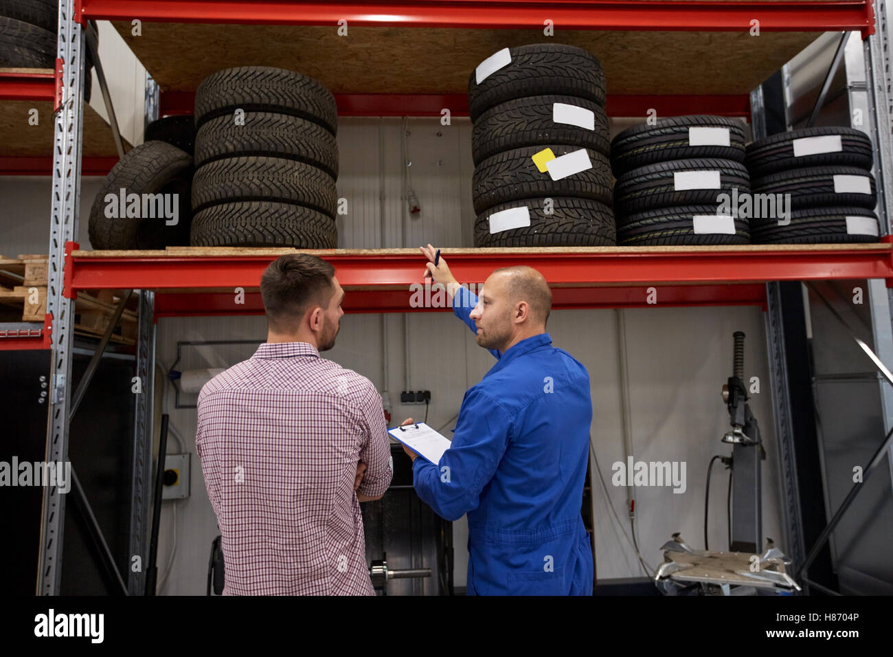 Man with tires hi-res stock photography and images - Alamy
