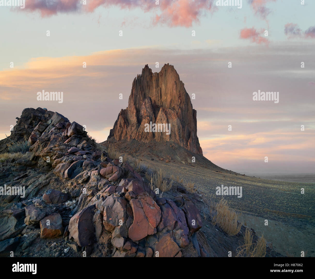 Ship Rock formation at sunset, remnant basalt core of extinct volcano ...