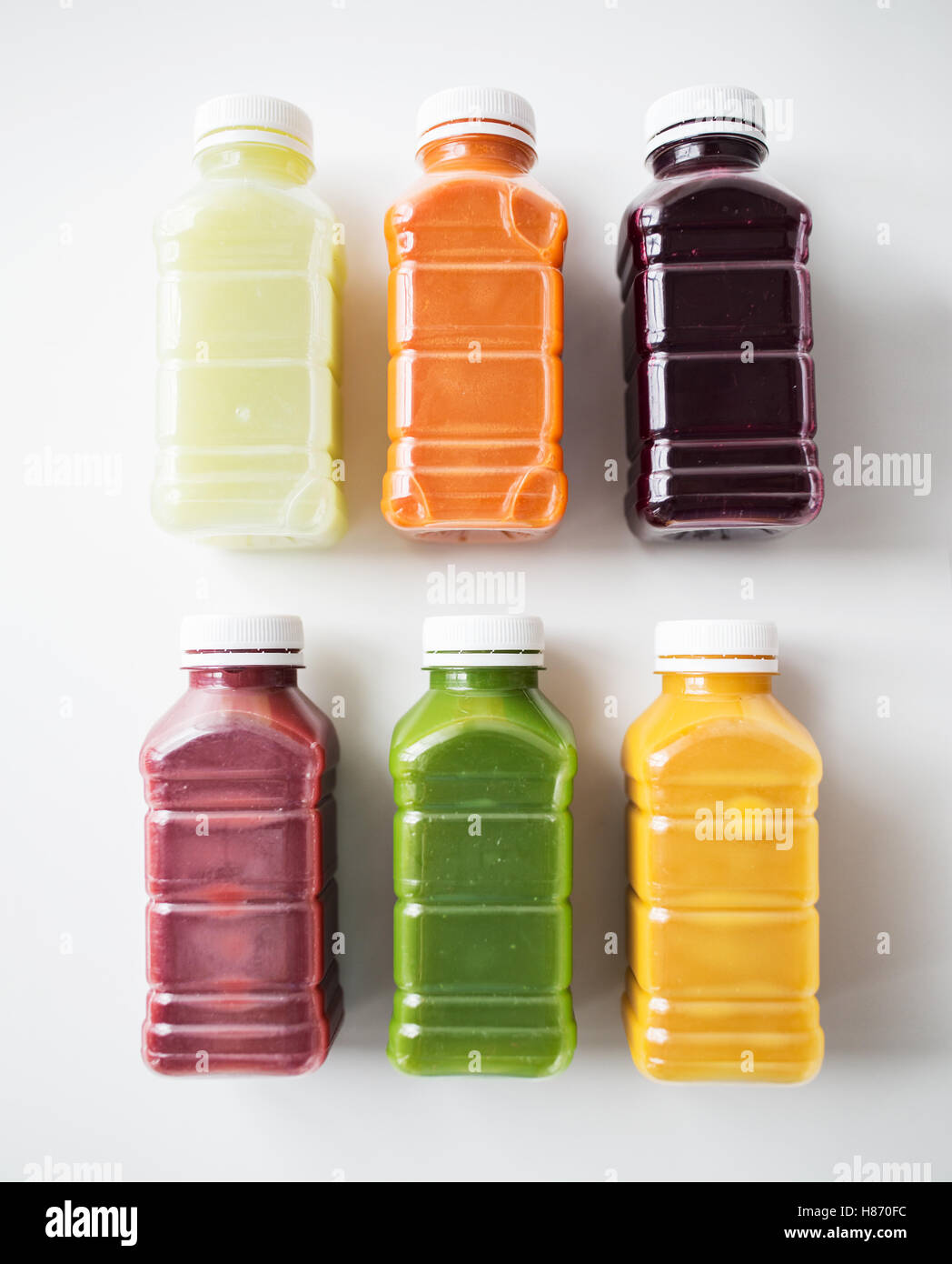 bottles with different fruit or vegetable juices Stock Photo - Alamy