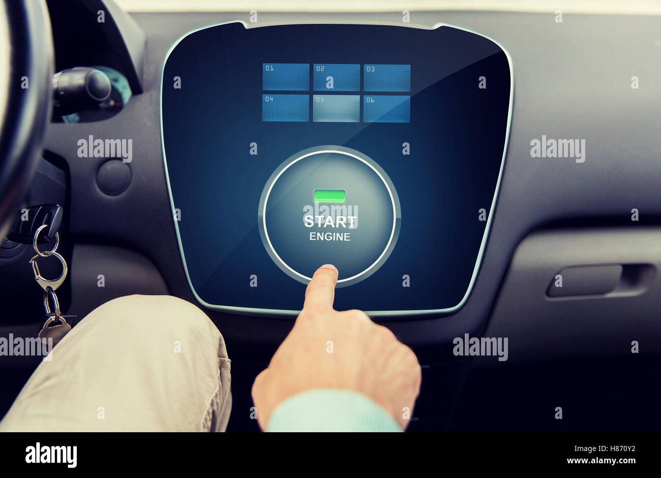 close up of man using starter application in car Stock Photo - Alamy