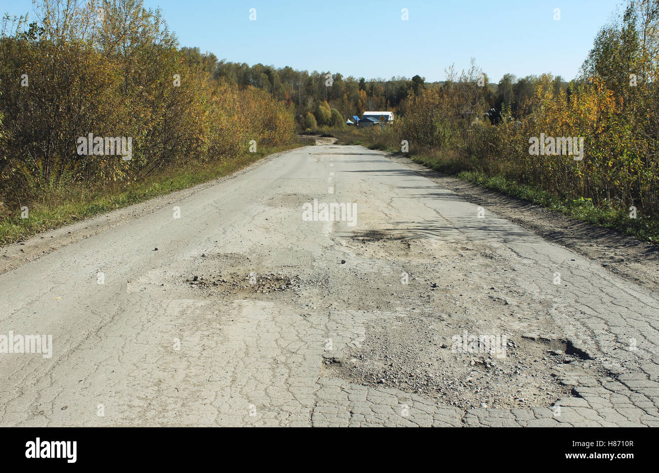 Large pit on the old road Stock Photo - Alamy