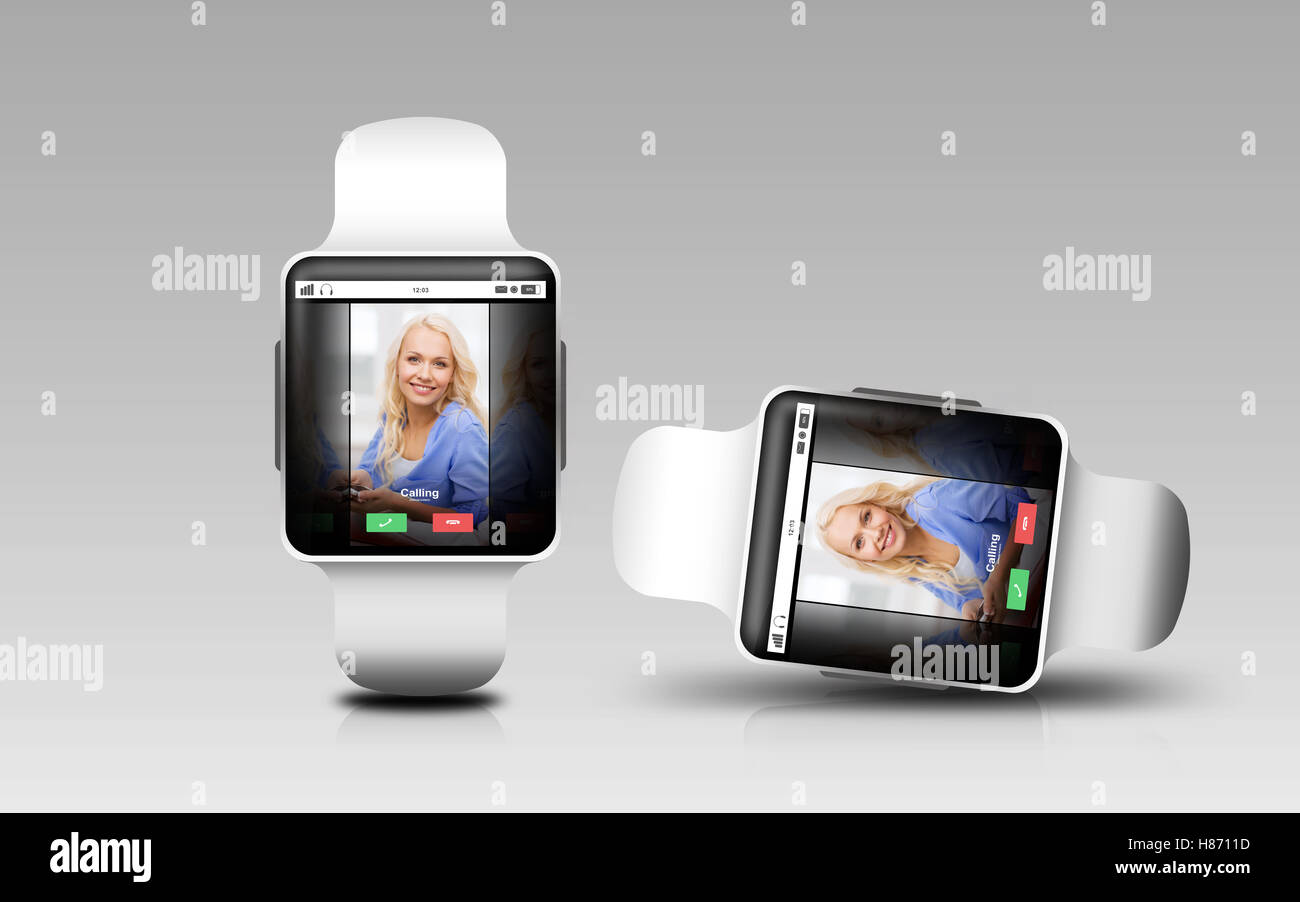 smart watches with incoming call on screen Stock Photo - Alamy
