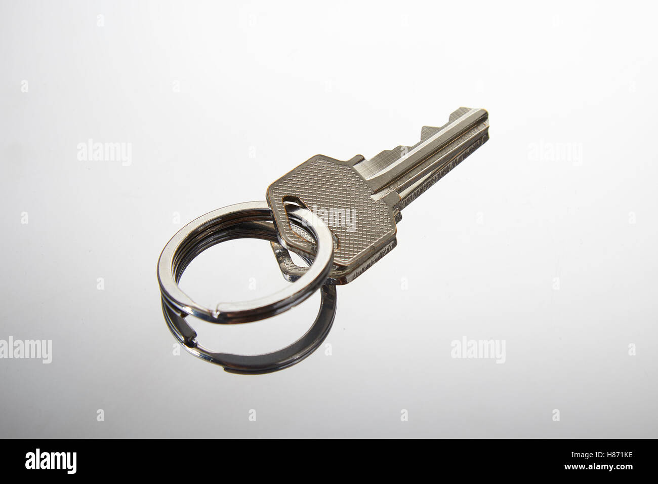 a key isolated with white background Stock Photo - Alamy