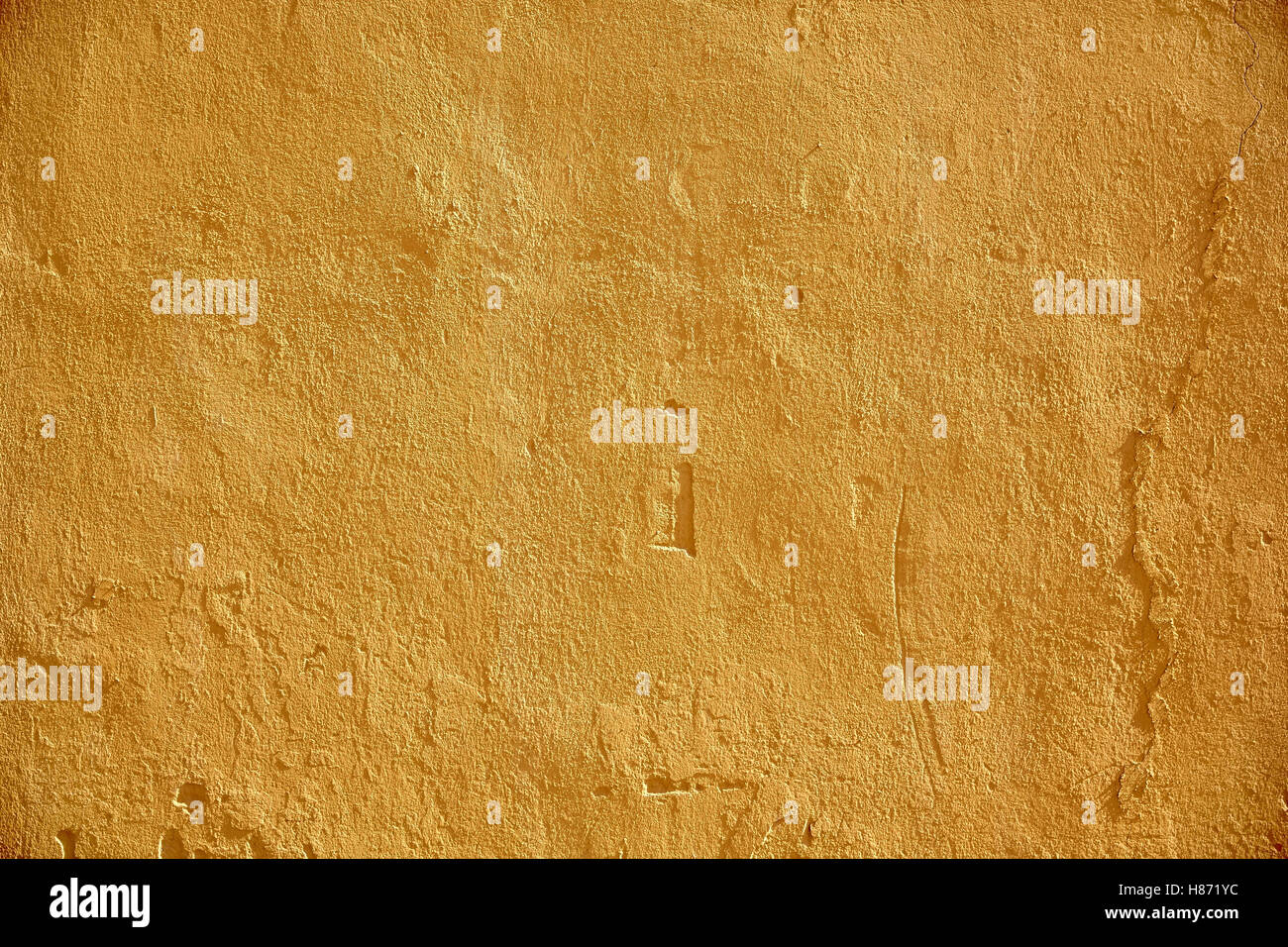 yellow painted stone wall surface Stock Photo - Alamy